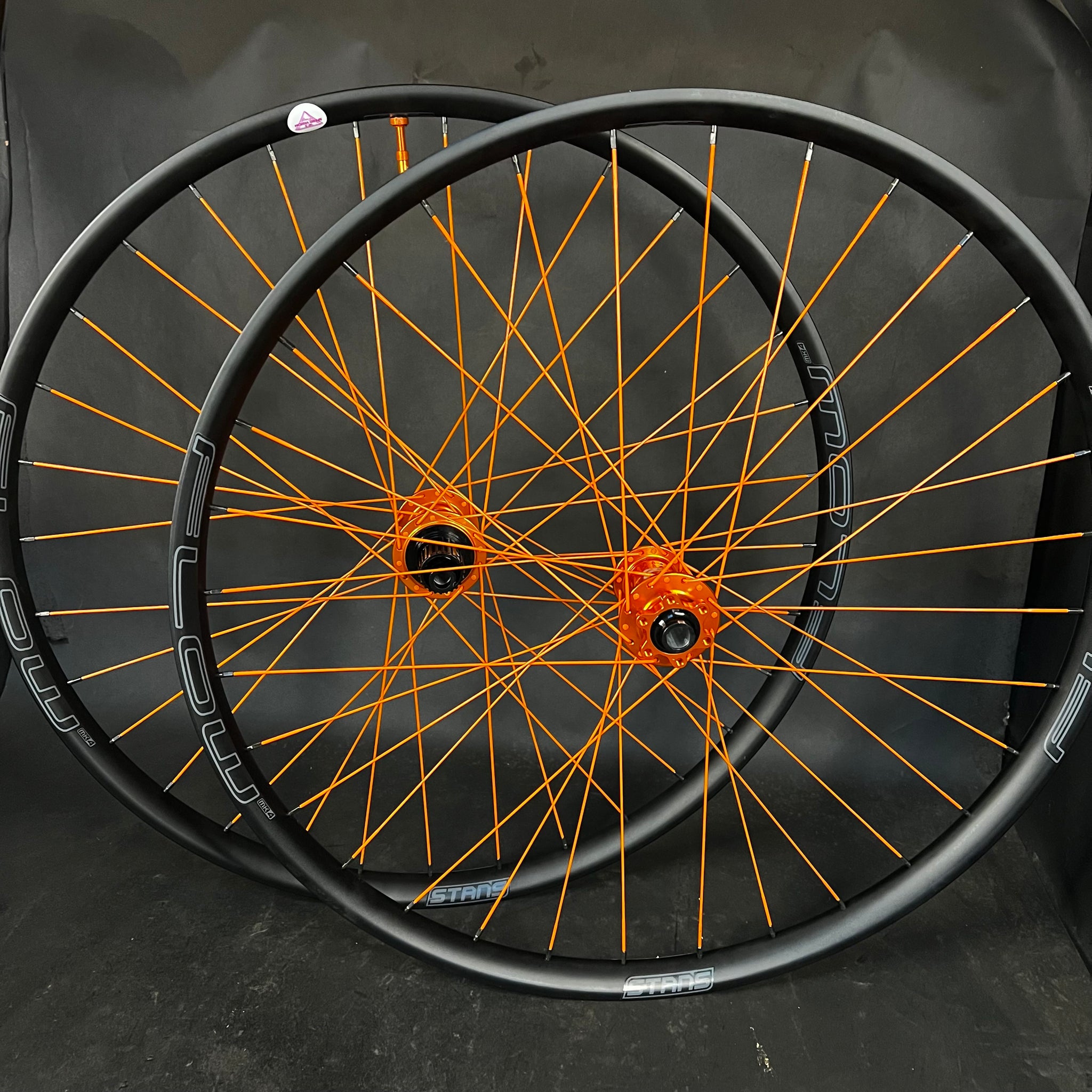 Trail: Full Orange Flow MK4 rims W/ Hydra 2 Boost hubs